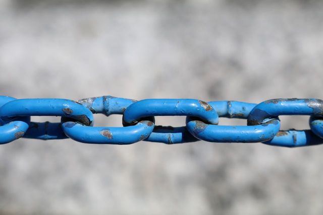 Close-up of blue metallic chain | ID: 85394809