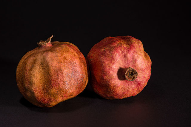 Close-up of pomegranates against black | ID: 144754808