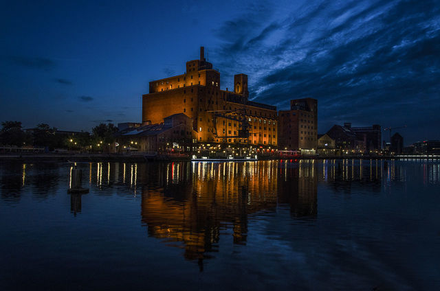 Illuminated buildings by lake against sky | ID: 134233462