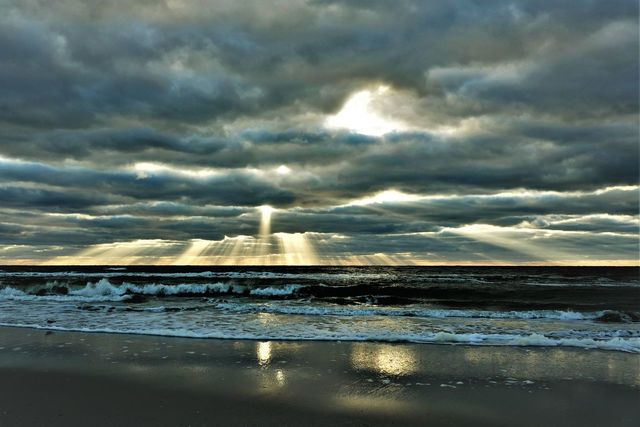 Scenic view of beach against dramatic sky | ID: 148905114