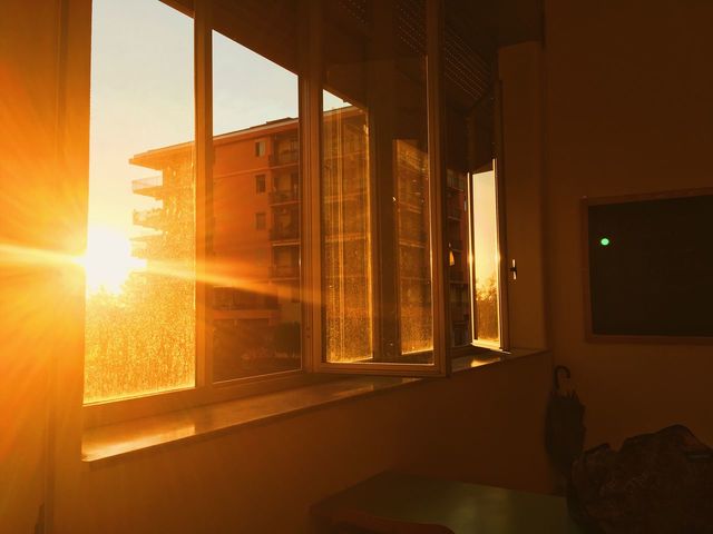 Sunlight streaming through window on | ID: 132279042