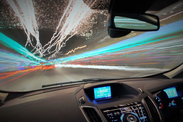 Colorful light trails seen through car | ID: 90224294