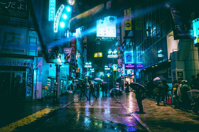People on illuminated street at night | ID: 114582141