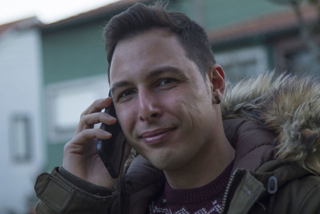 Close-up portrait of smiling young man | ID: 187925261
