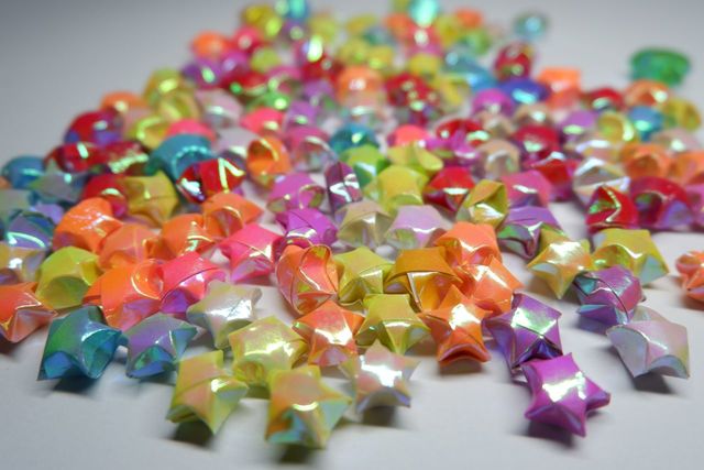 Close-up of multi colored paper on table | ID: 138636083