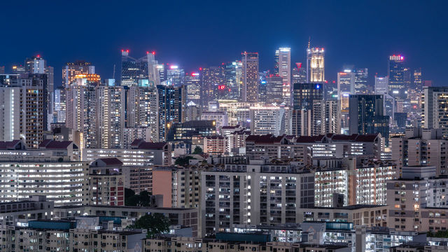 Illuminated buildings in city at night | ID: 204422349