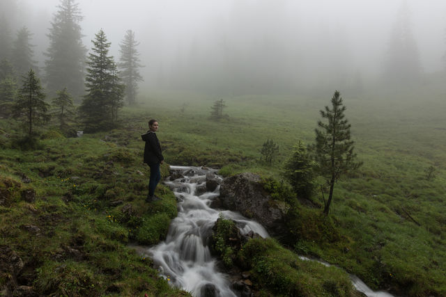 Side view of woman standing by stream during | ID: 88906875