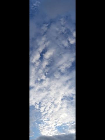 Low angle view of sky and clouds | ID: 100870255