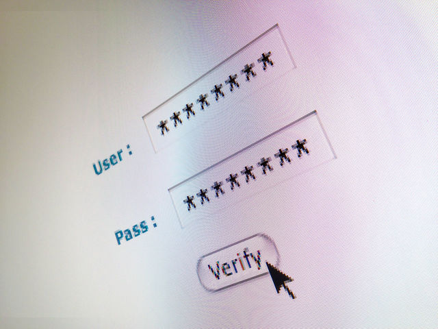 Close-up of cursor at verify button computer | ID: 84580750