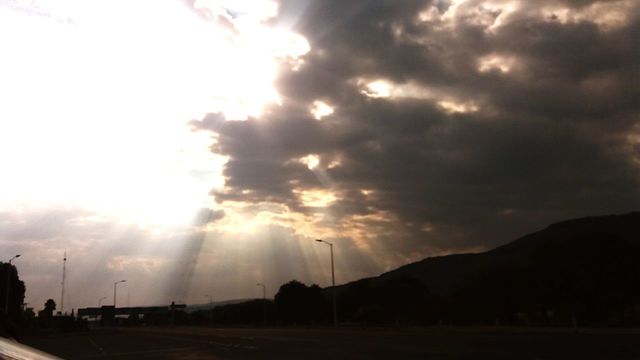 Sun shining over landscape | ID: 123445098