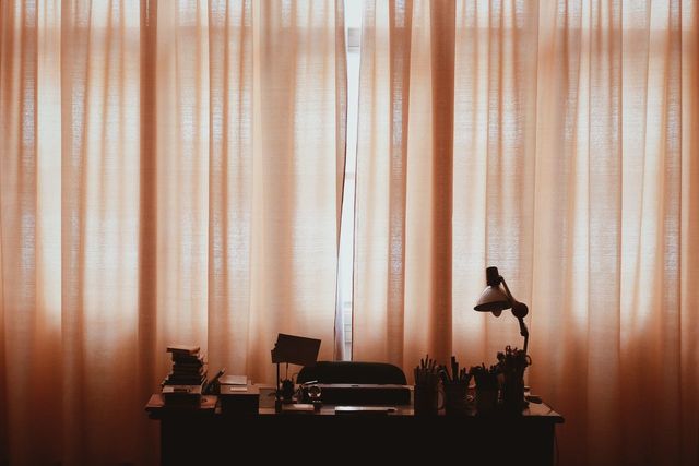Table by curtain at home | ID: 89820875