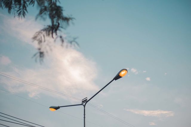 Low angle view of street light against sky | ID: 129576727