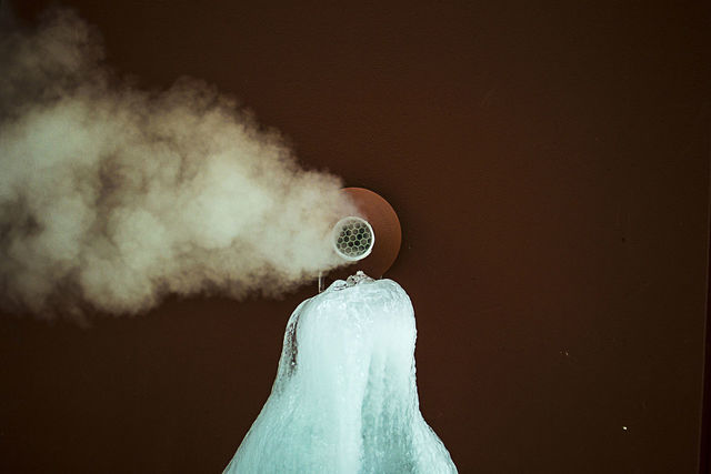Ice melting under steam vent | ID: 93026102