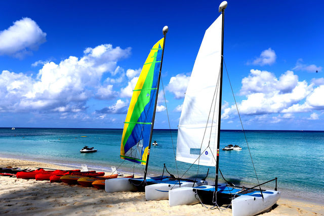 Sailboat on beach against sky | ID: 144080004