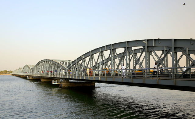 Bridge over river in city against clear sky | ID: 139474477
